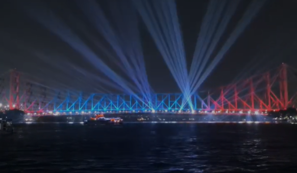 Howrah Bridge lights up ahead of International Yoga Day celebrations in ...